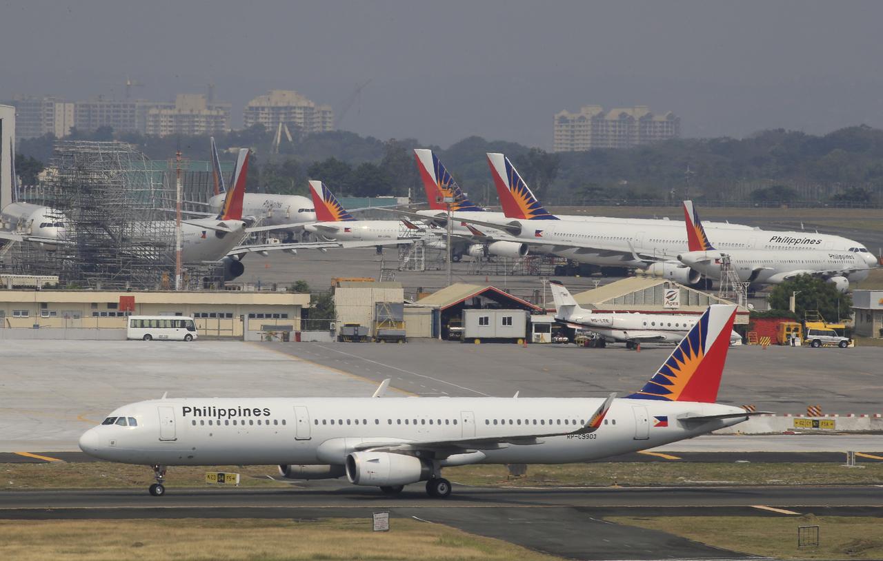 Philippine Airlines plans to slash workforce by more than a third after ...